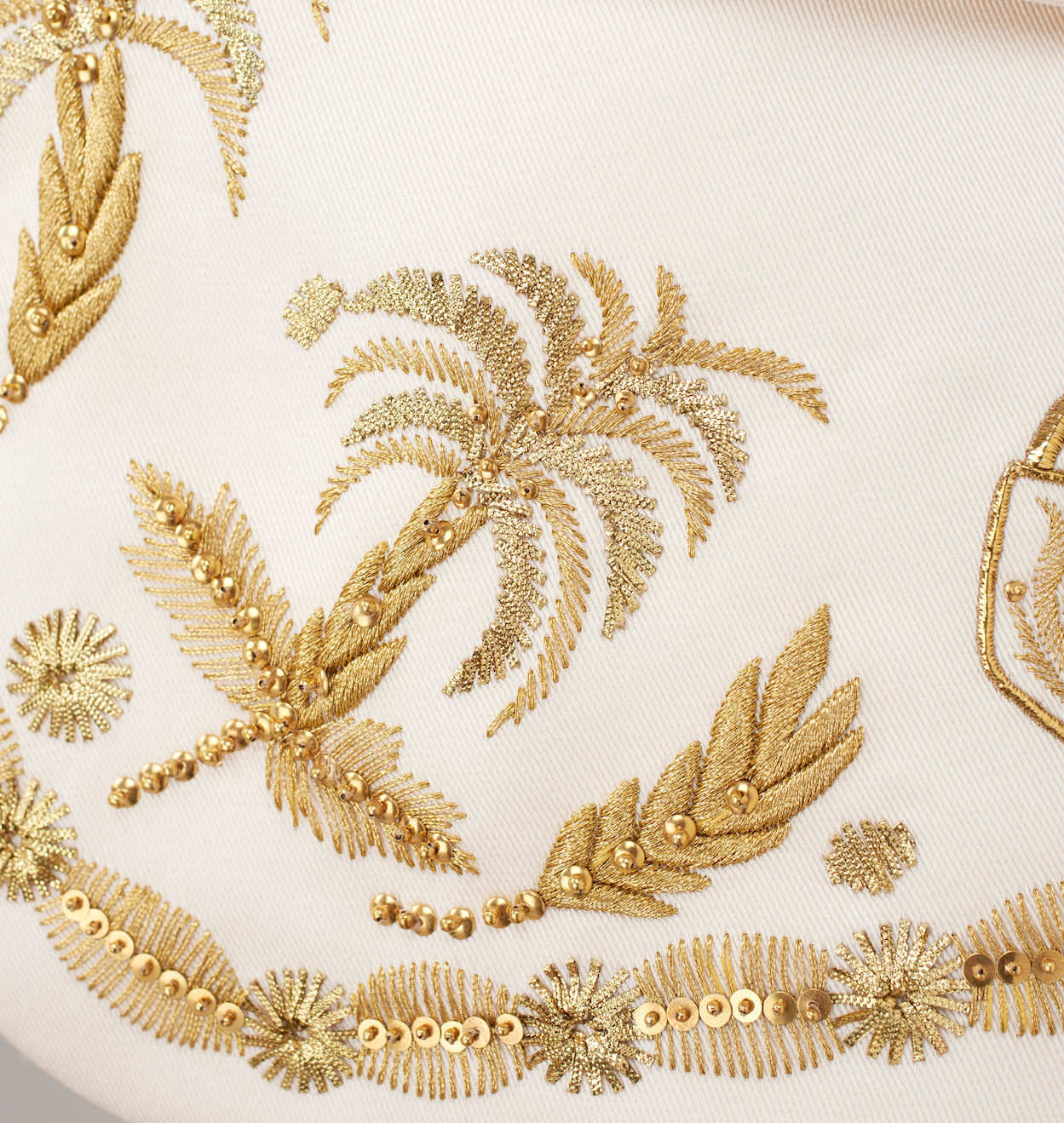Schiaparelli’s Storied Golden Palm Motif Makes a Comeback – SURFACE